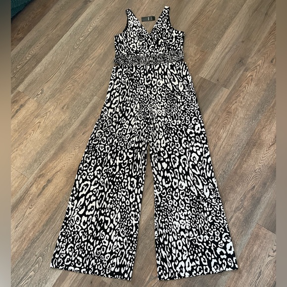 bebe | Pants & Jumpsuits | Nwt Bebe Wide Leg Romper With Side Cut Out ...
